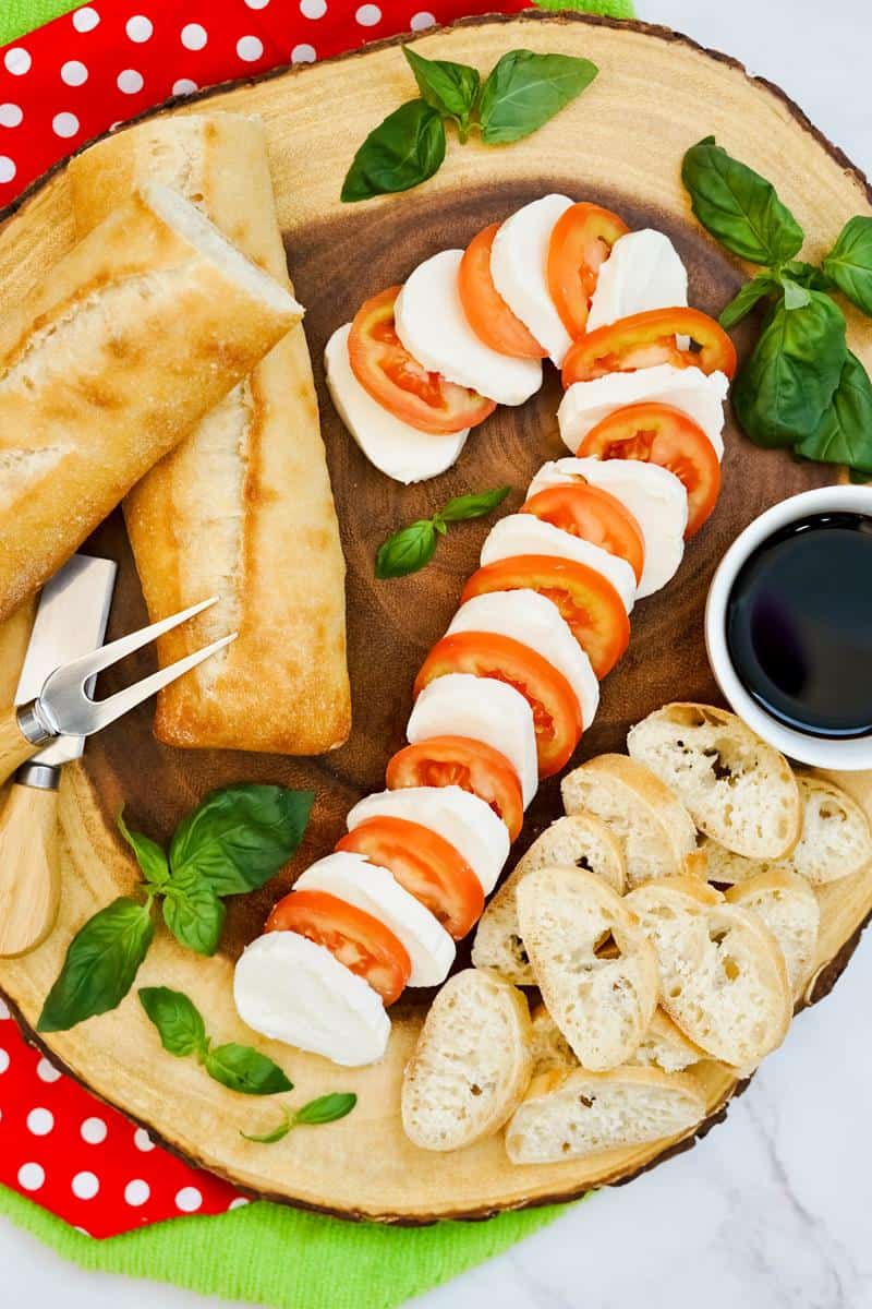 Candy Cane Caprese Cheese Board - Unique Gifter