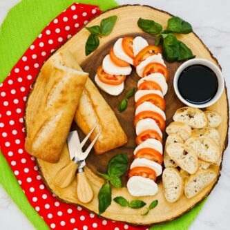 Candy Cane Caprese Cheese Board - Unique Gifter